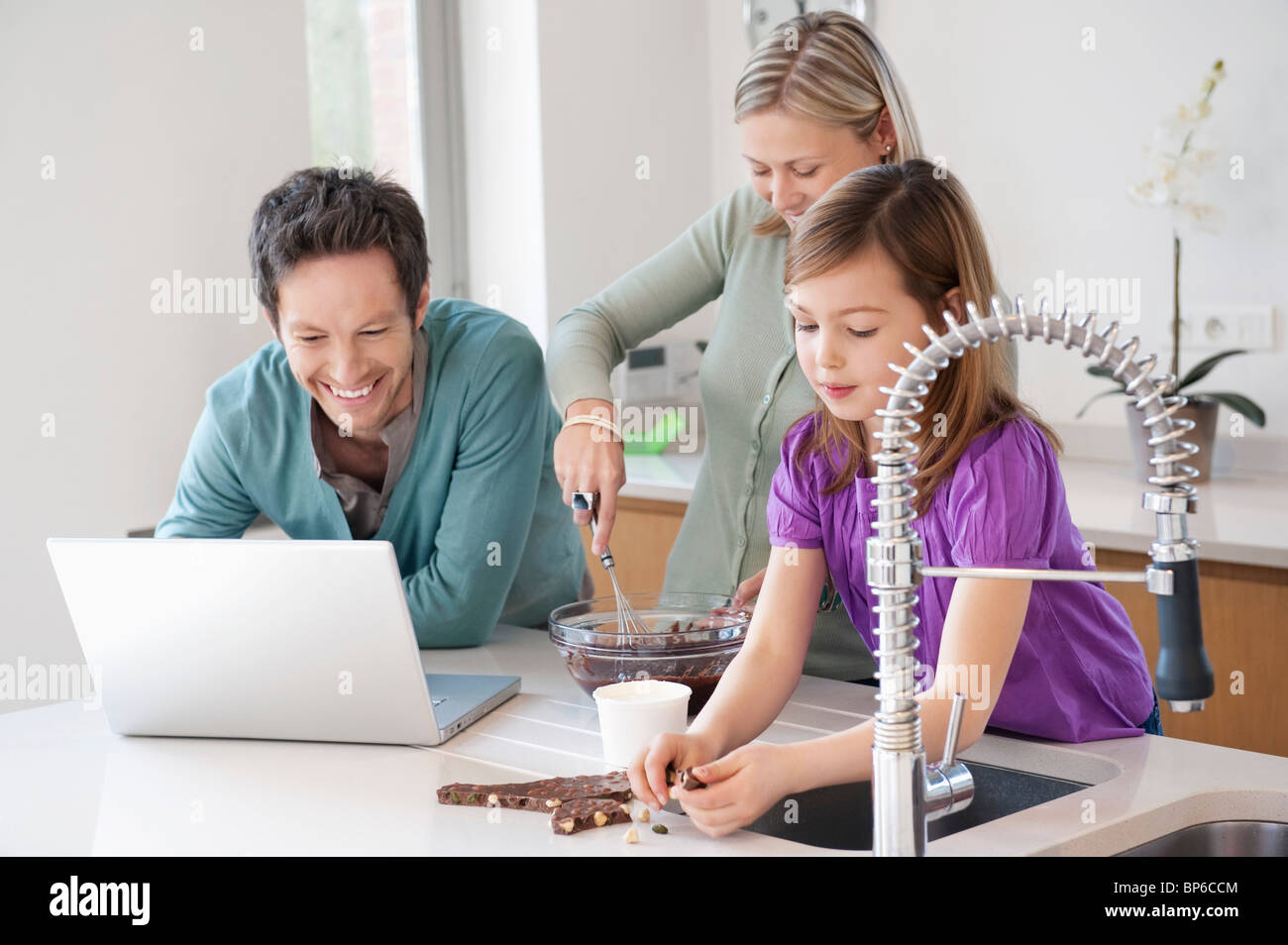 Child mixing food laptop hi-res stock photography and images - Alamy