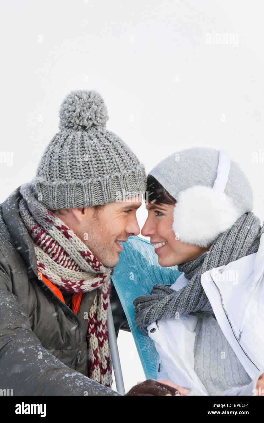 Young couple embracing, touching foreheads Stock Photo - Alamy