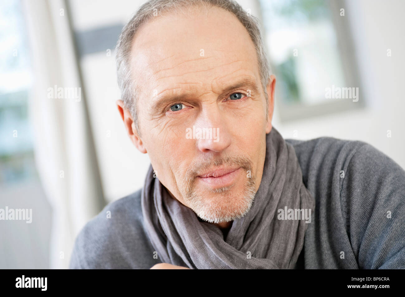 Portrait of a man thinking Stock Photo - Alamy