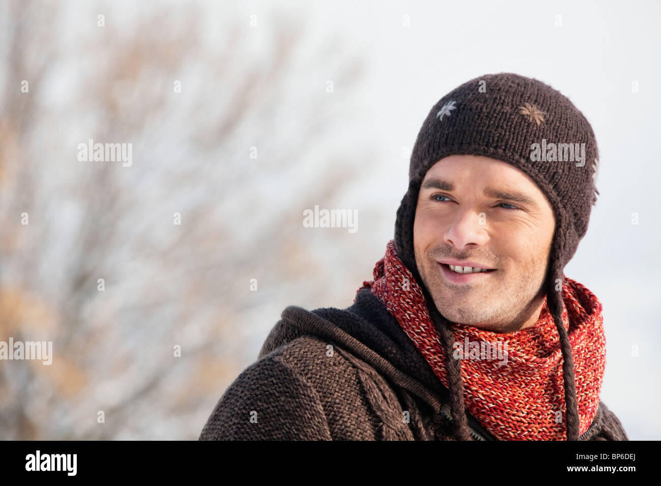 Portrait of young man in winter clothes Stock Photo - Alamy