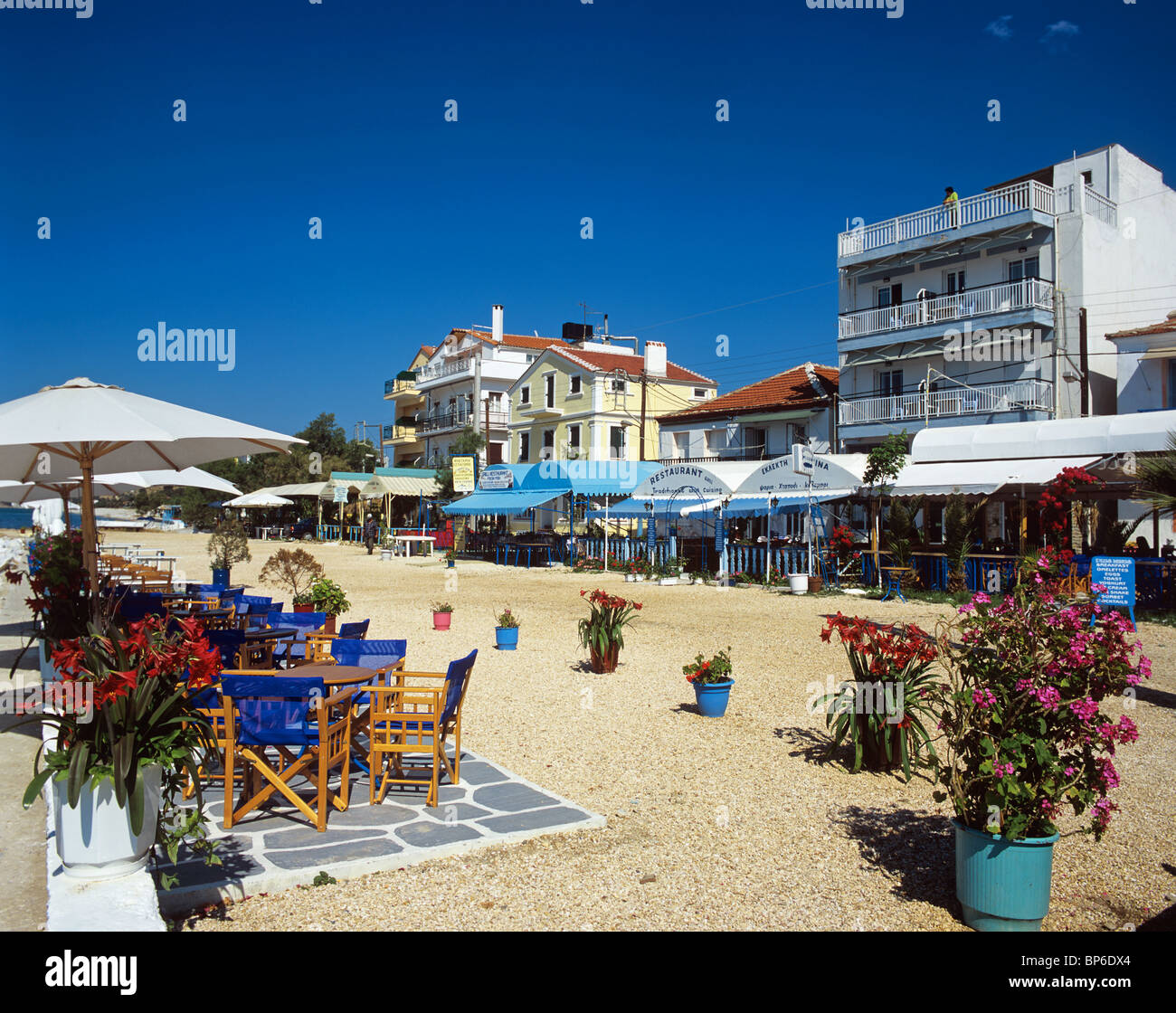 Colourful waterfront tavernas in the resort of Limenaria the second ...