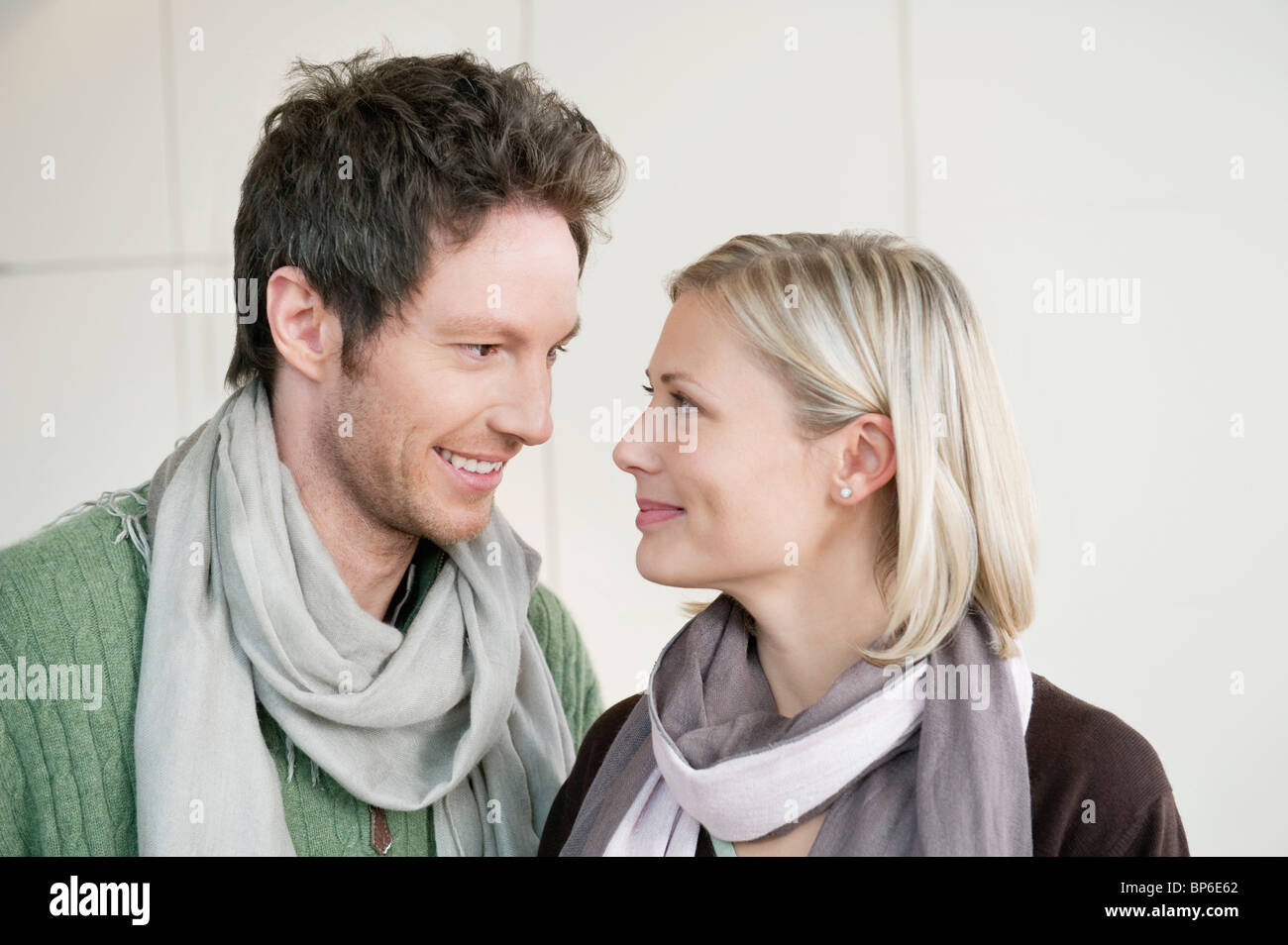 Couple smiling at each other Stock Photo - Alamy