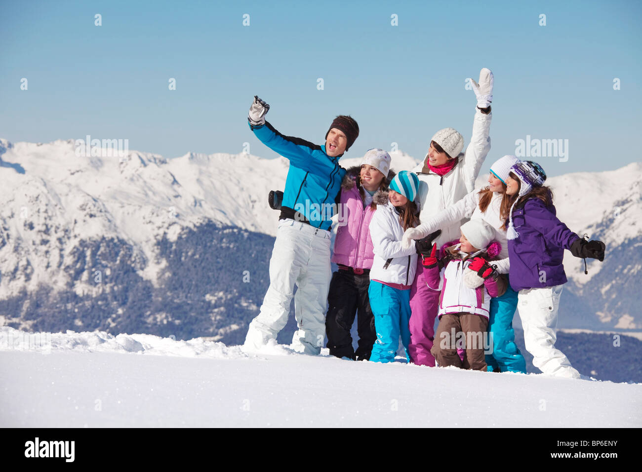 Family taking self portrait in snow Stock Photo - Alamy