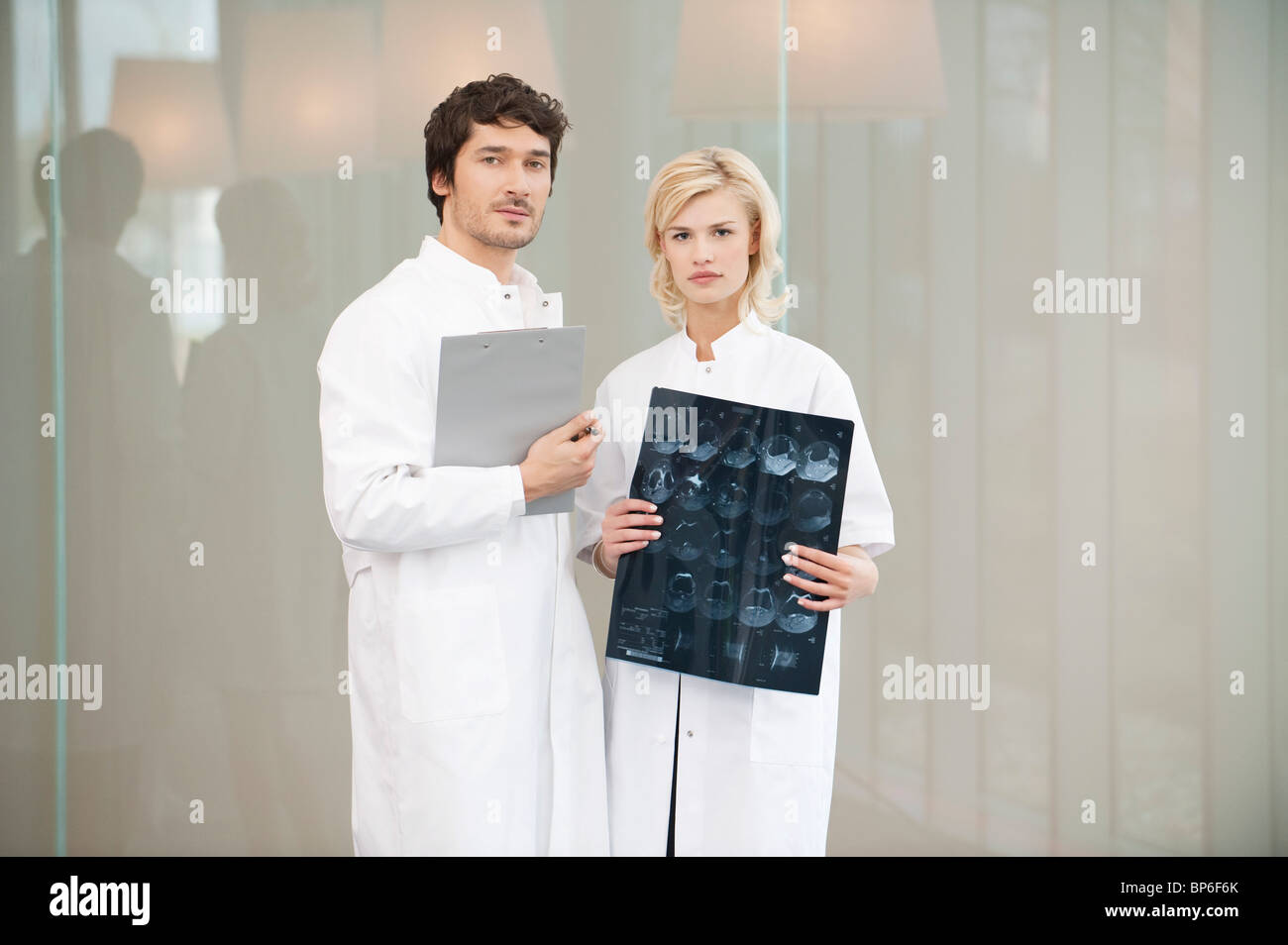 Two doctors standing together Stock Photo - Alamy