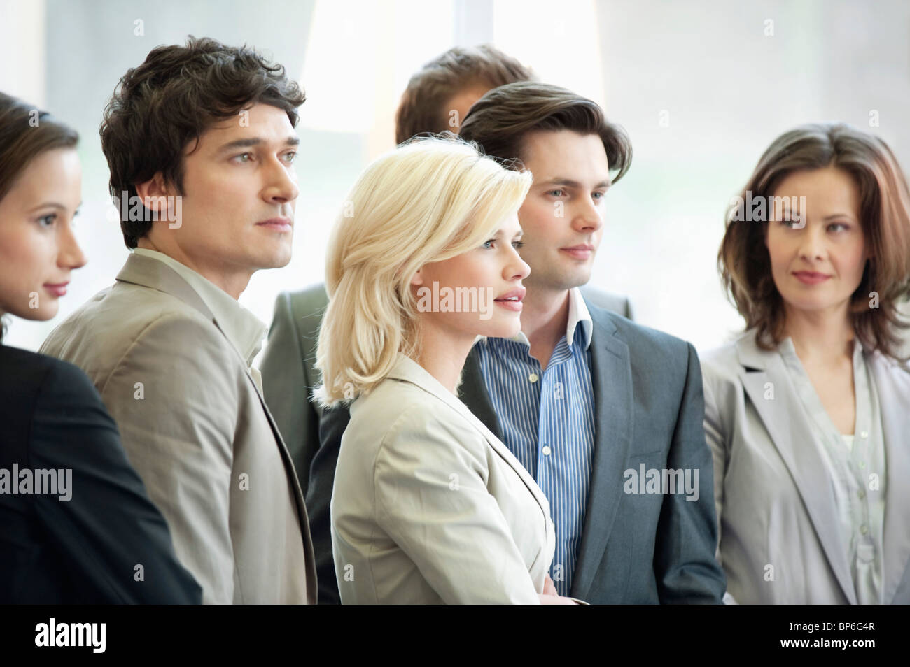 Business executives standing together Stock Photo - Alamy