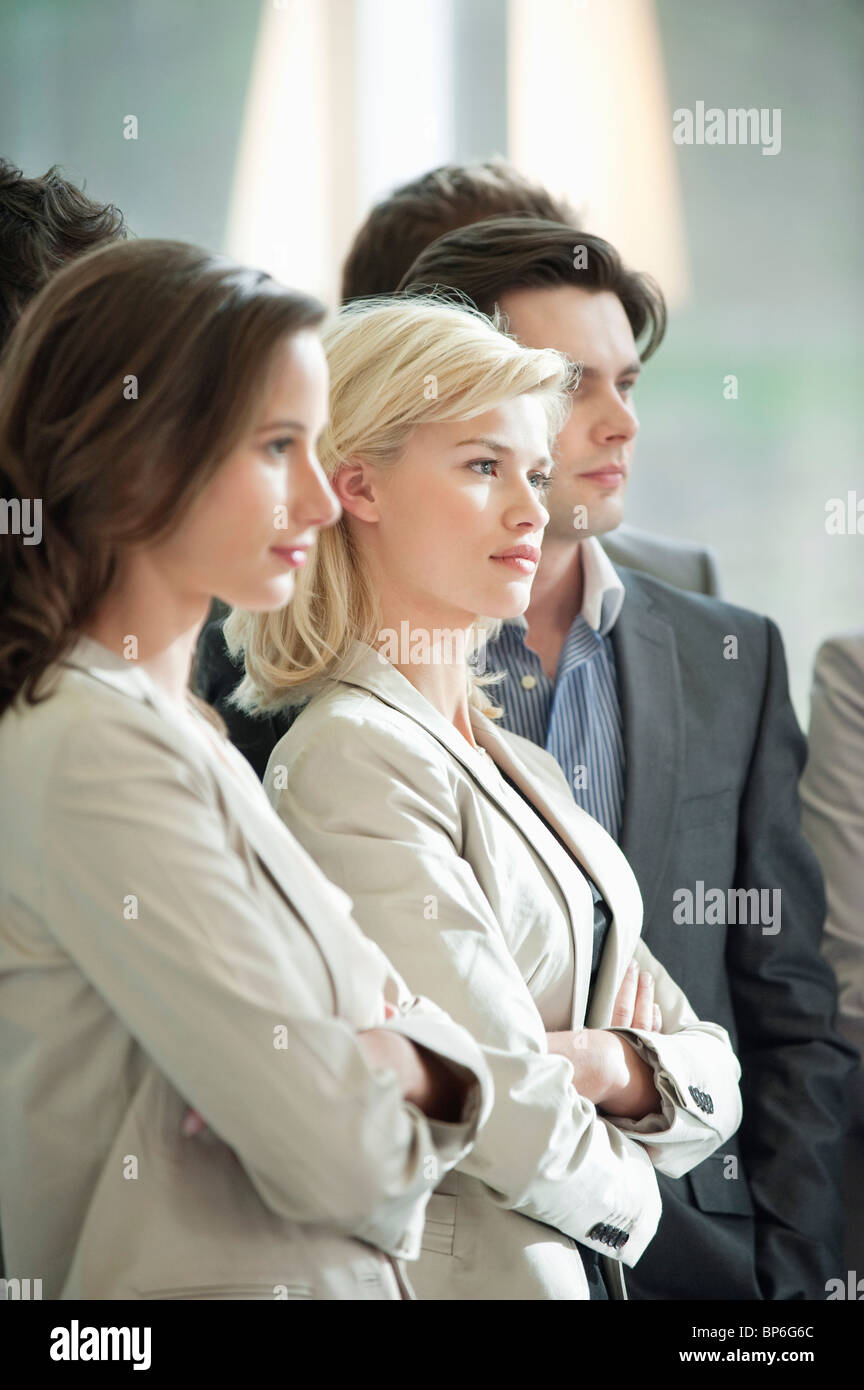 Business executives standing together Stock Photo - Alamy