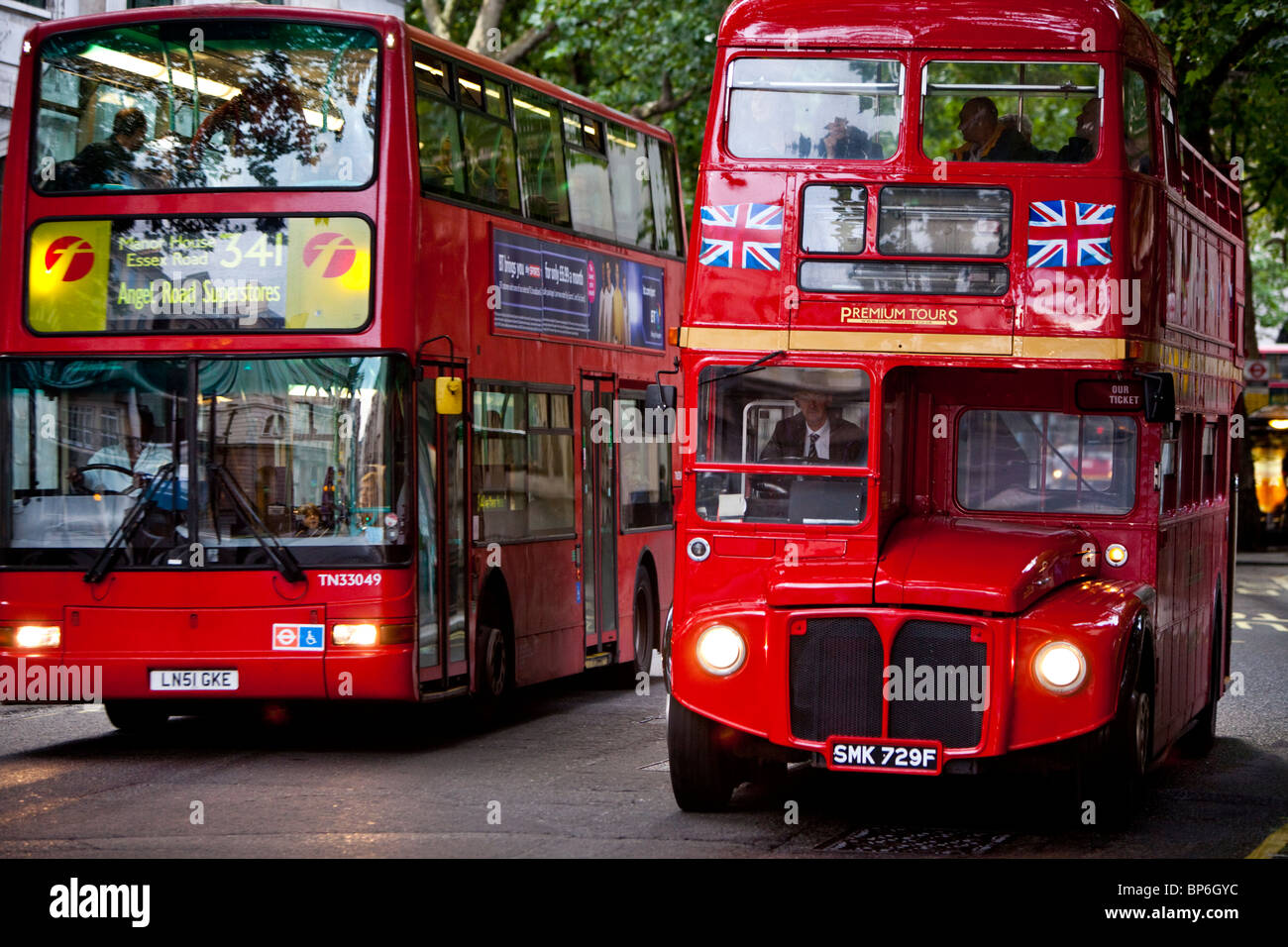 Double decker buses in Central London, England, UK Stock Photo - Alamy