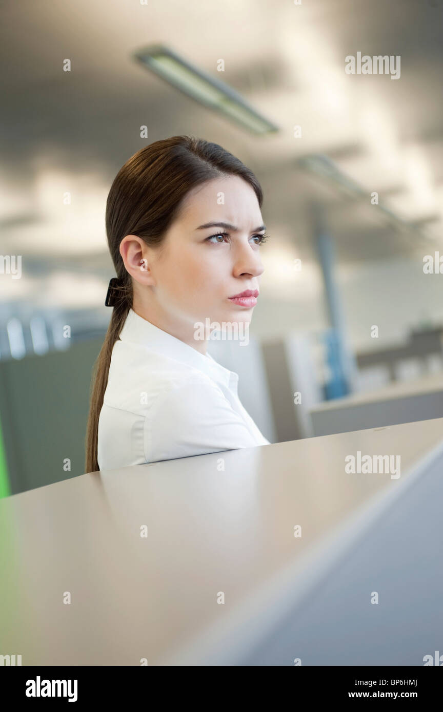 Businesswoman looking serious Stock Photo - Alamy