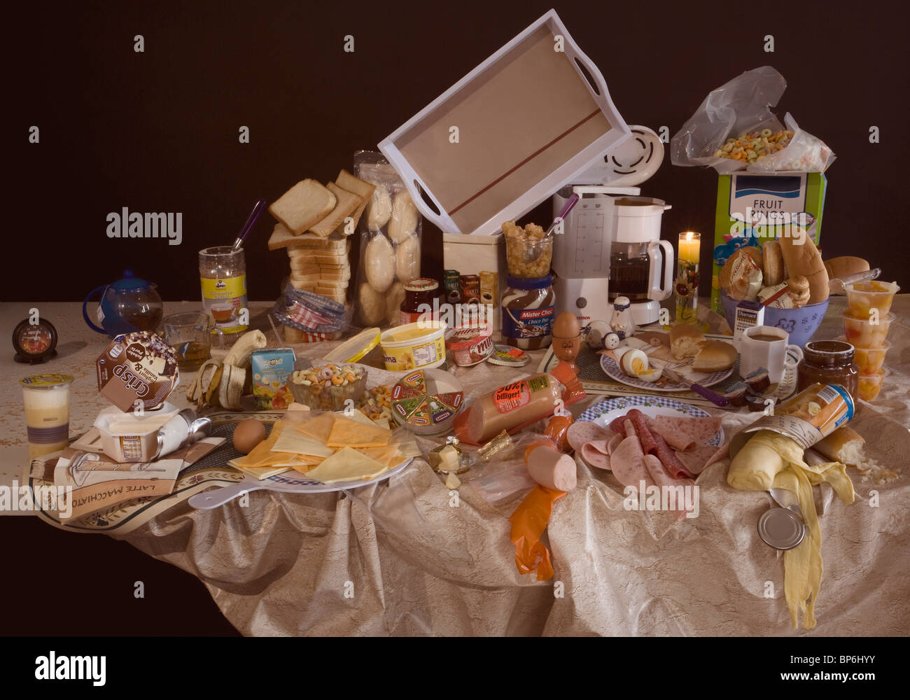 An excess of breakfast foods on a table, still life Stock Photo - Alamy