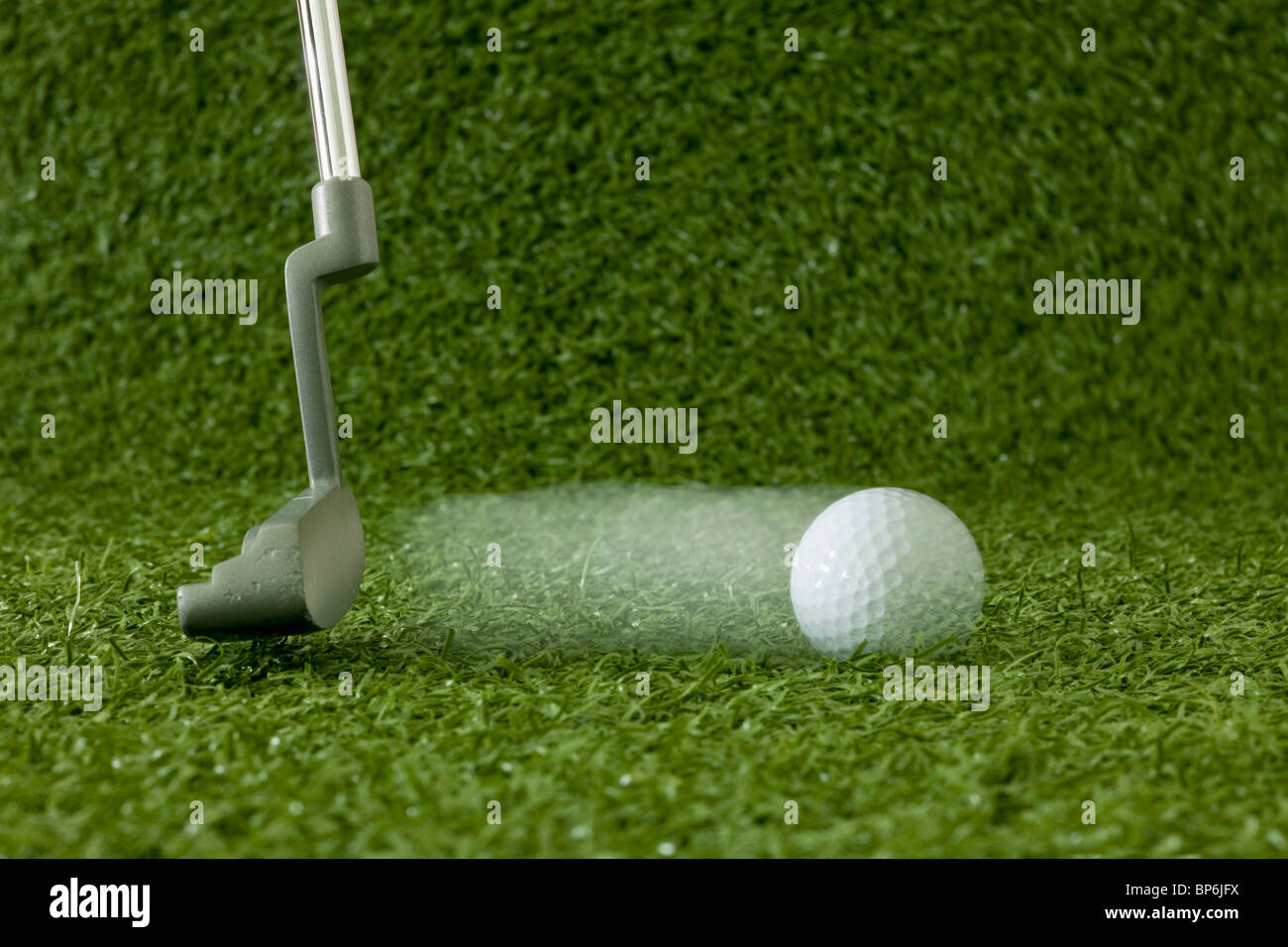 A golfer putting, detail of ball and putter head Stock Photo - Alamy