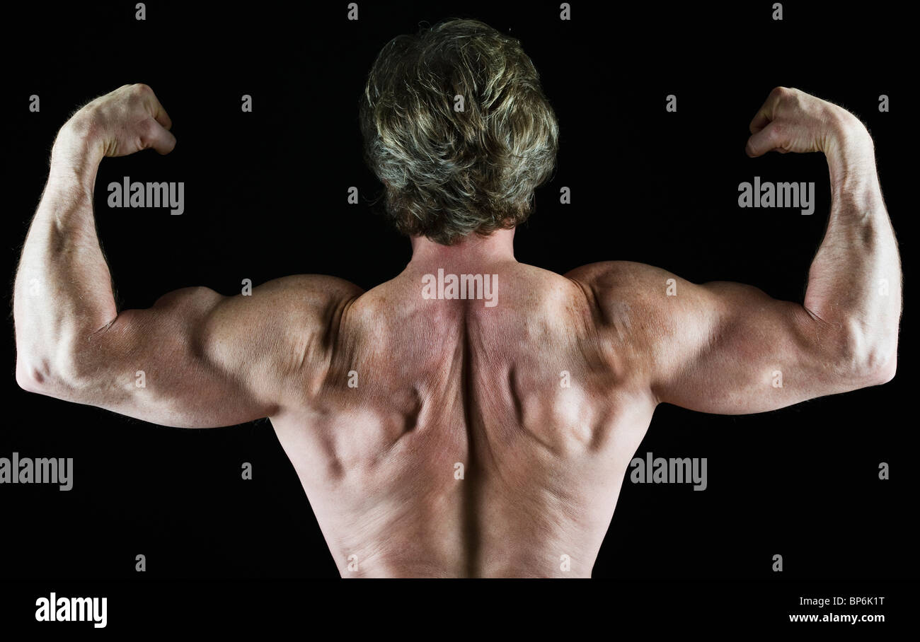 Muscular man flexing his biceps Stock Photo - Alamy Muscular man flexing his biceps Stock Photo - Alamy