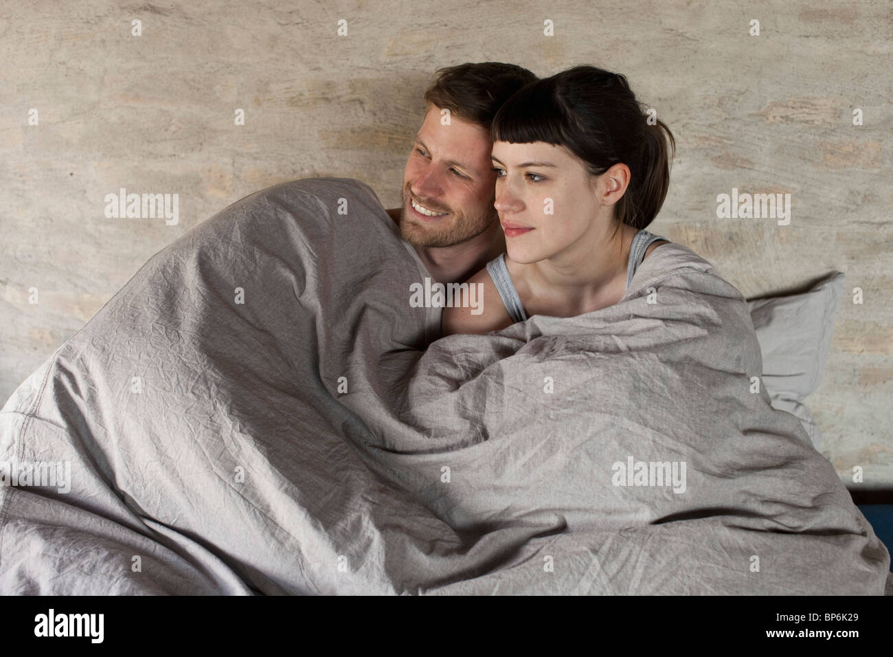 Snuggling In Bed High Resolution Stock Photography and Images - Alamy