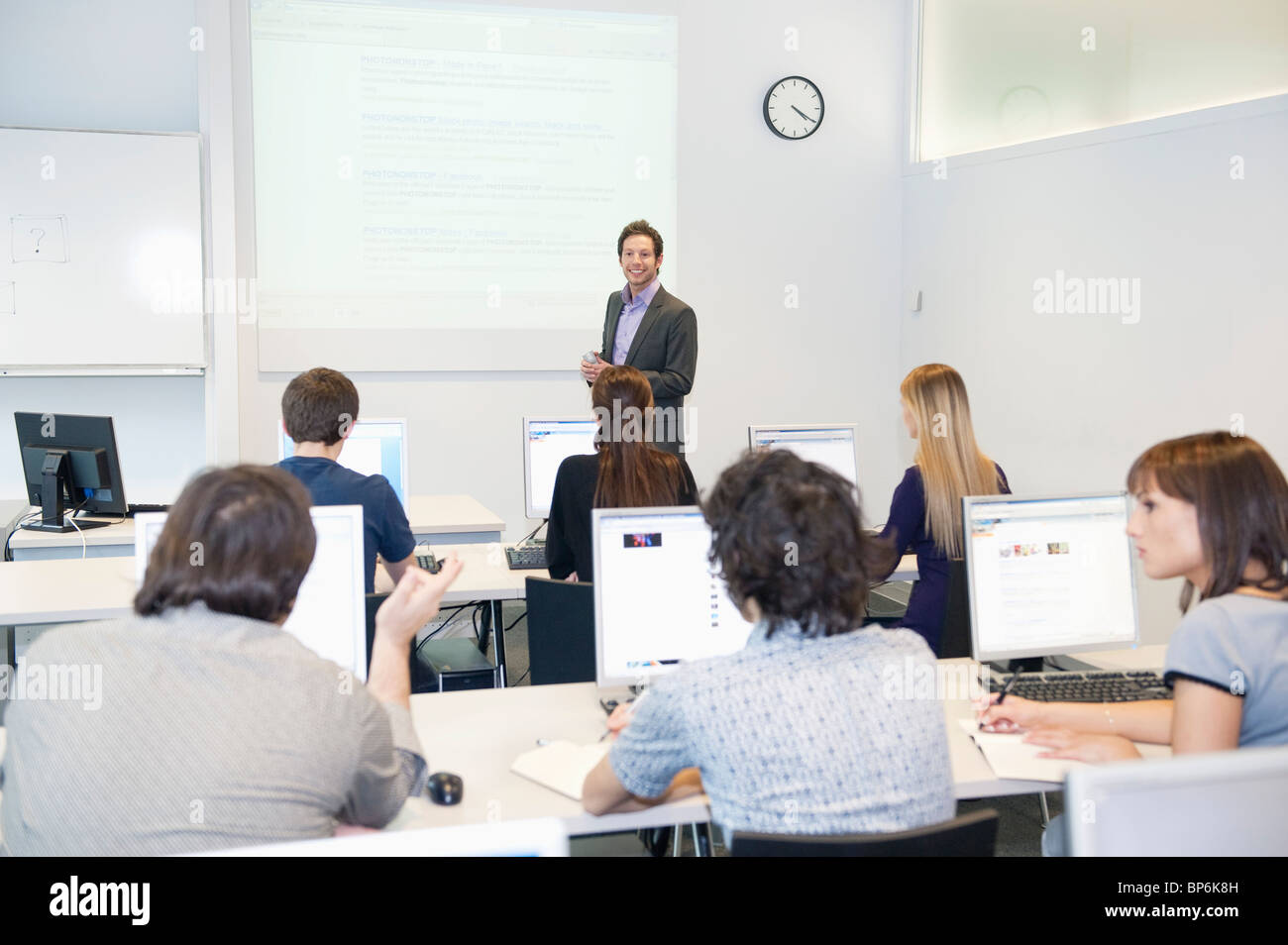 Business executives in a training class Stock Photo - Alamy