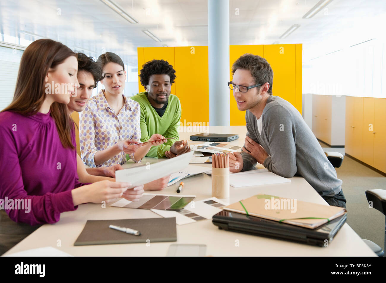 Business executives discussing in an office Stock Photo - Alamy