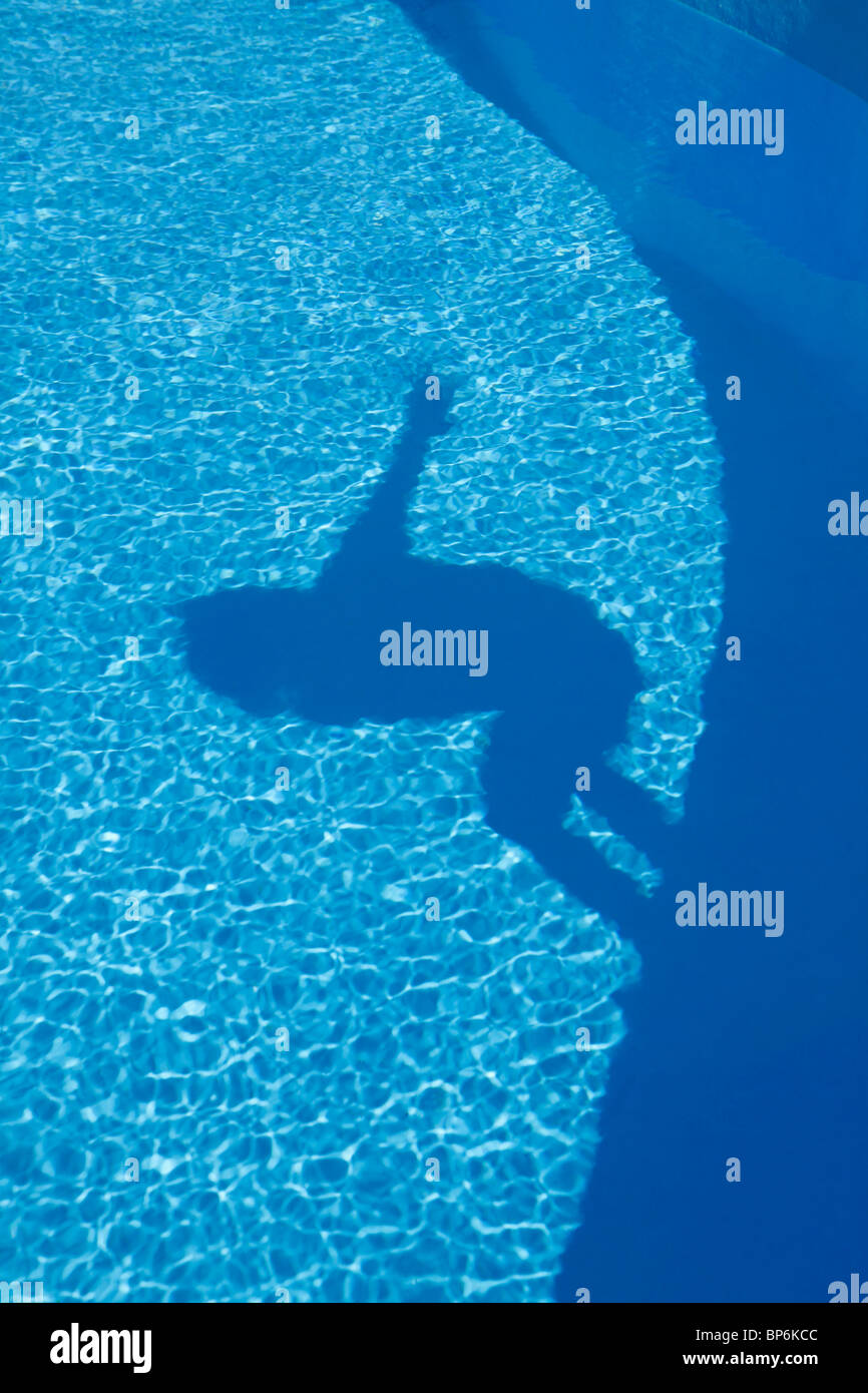 Shadow of a person jumping into a swimming pool Stock Photo - Alamy