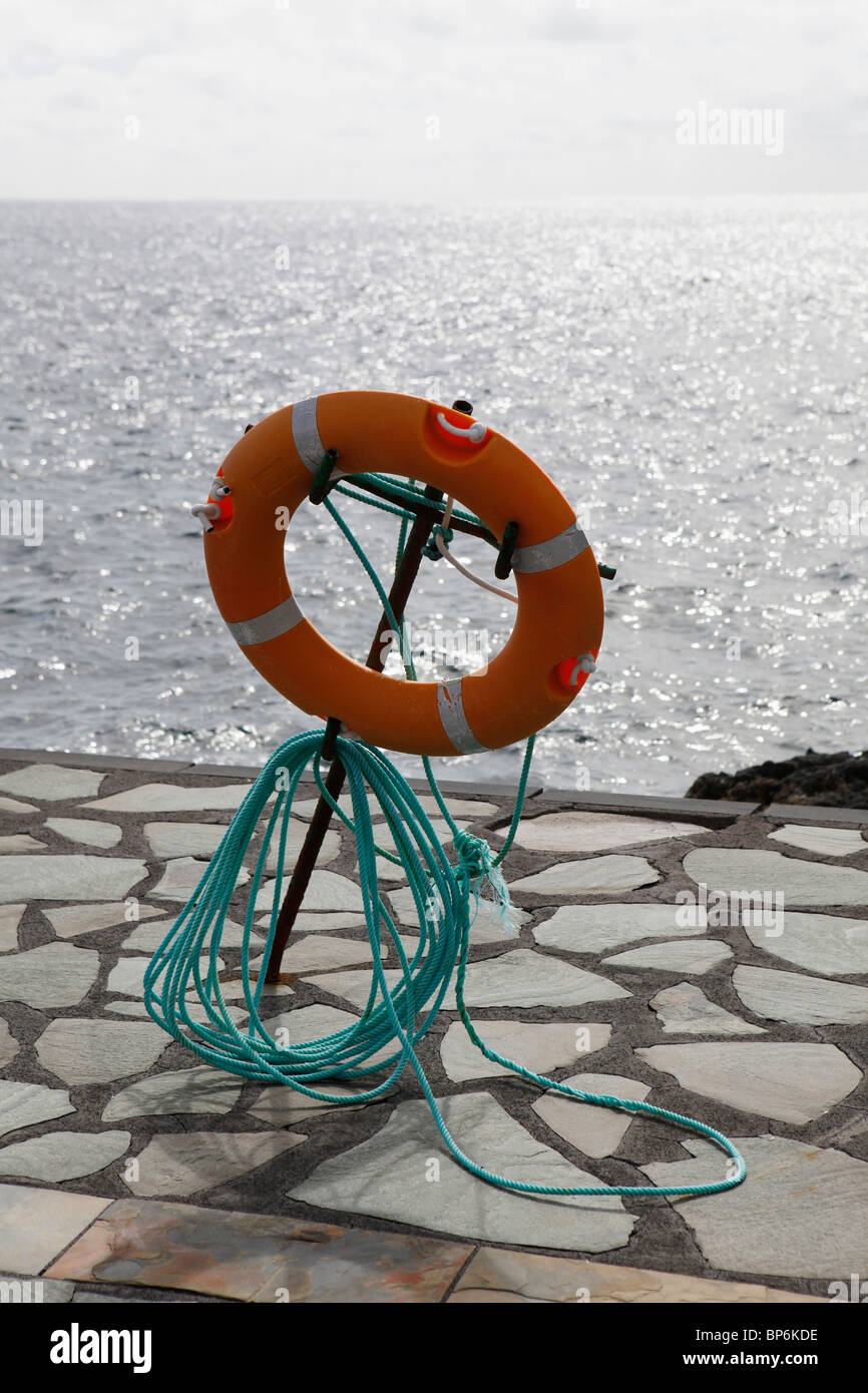 A life preserver on a pier Stock Photo - Alamy