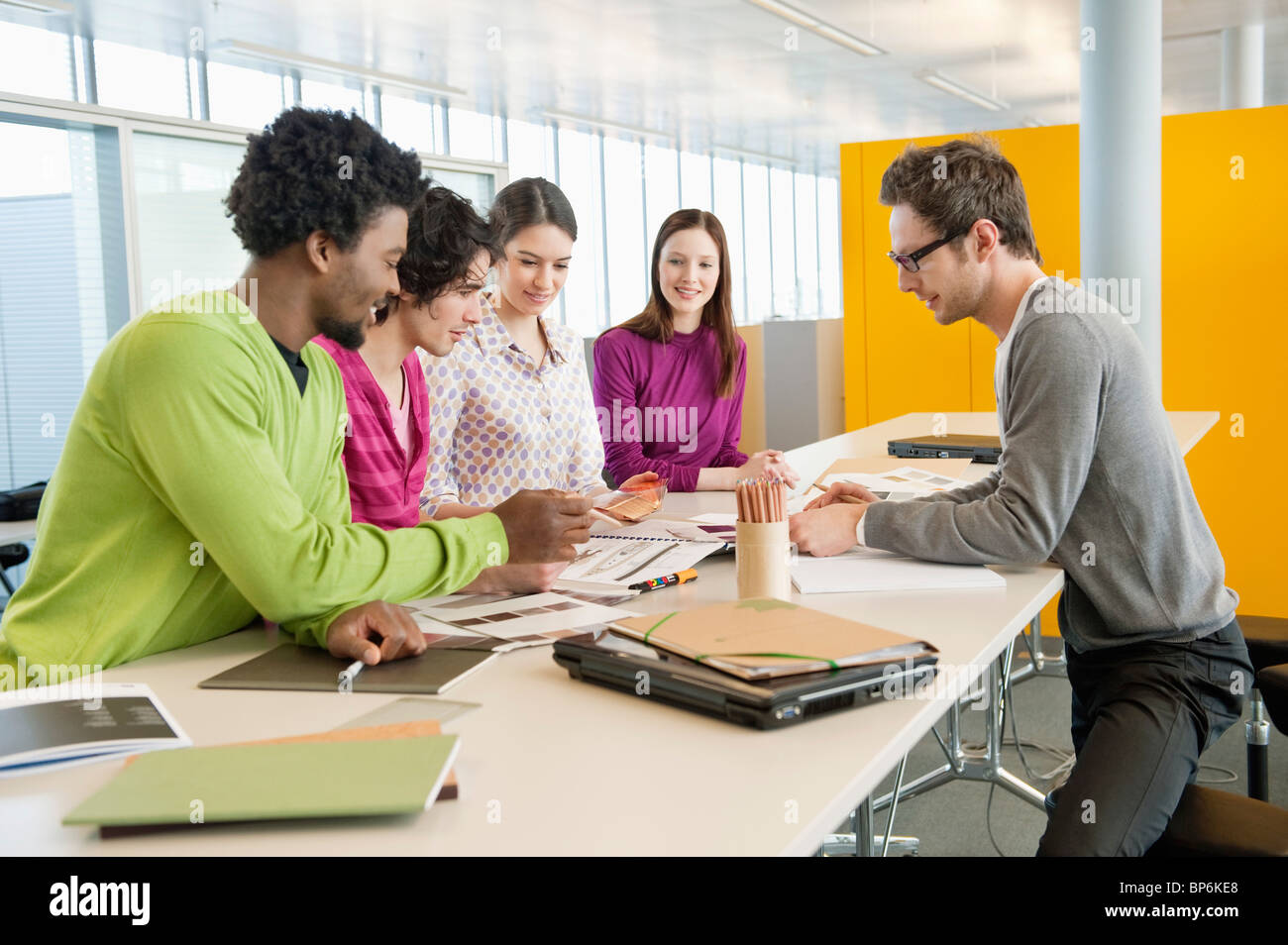 Business executives discussing in an office Stock Photo - Alamy