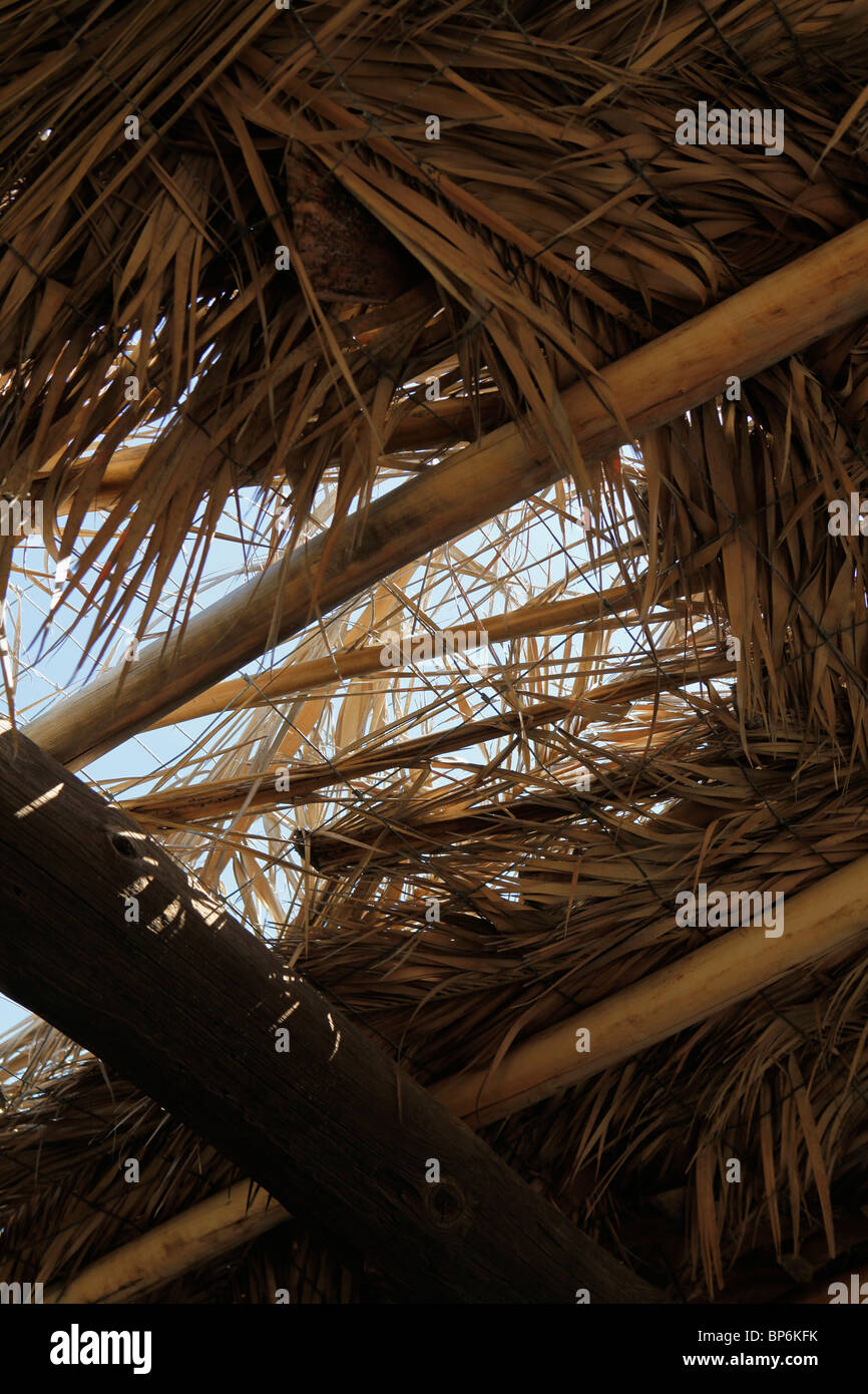 Detail of a damaged thatched roof Stock Photo - Alamy