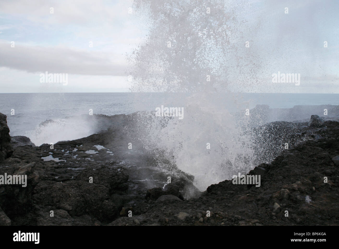 Water splashing on rocks Stock Photo - Alamy