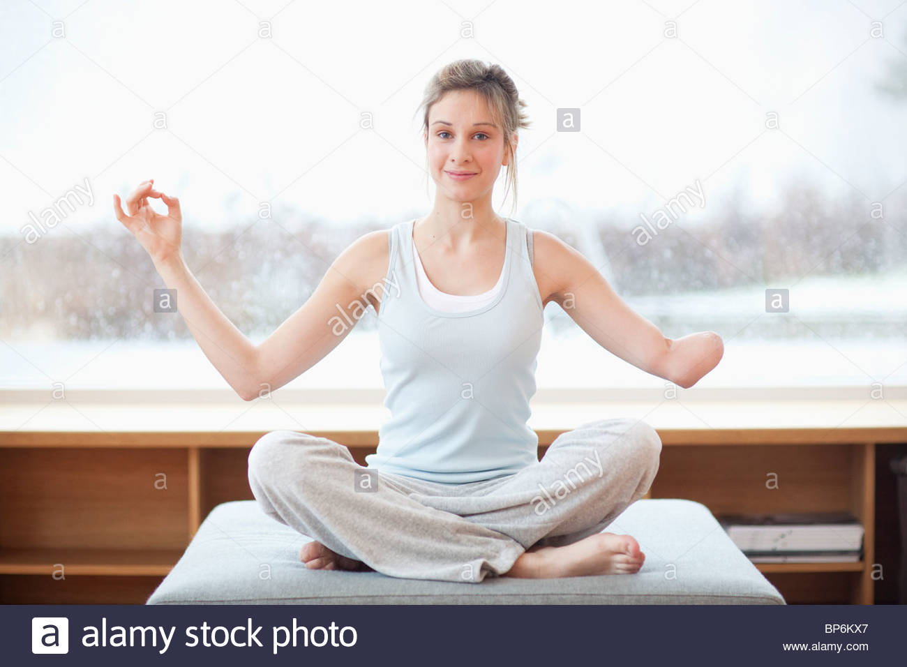 Young woman with amputee arm in yoga pose Stock Photo: 30880143 - Alamy