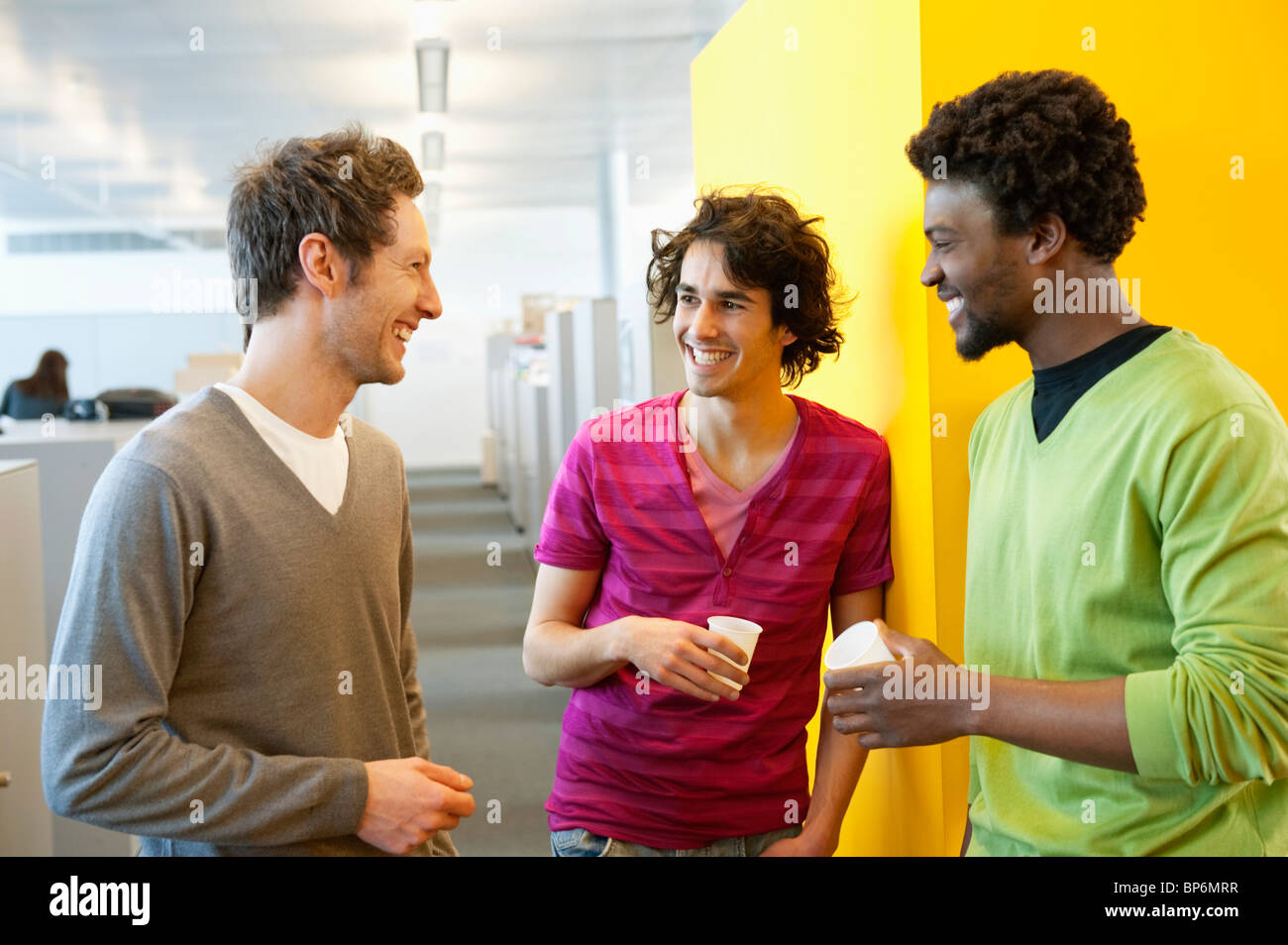 Businessmen drinking tea in an office Stock Photo - Alamy