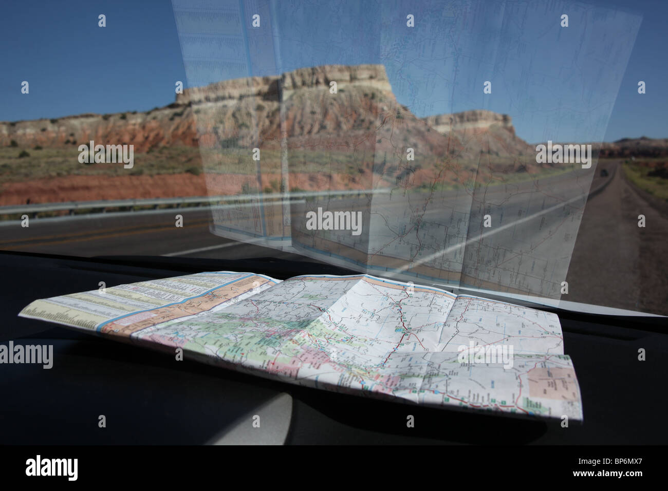 Road map on dashboard of passenger car on Route 550 in New Mexico, USA ...
