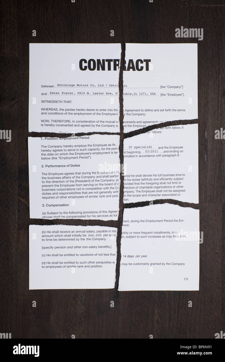 An employment contract torn into pieces Stock Photo - Alamy