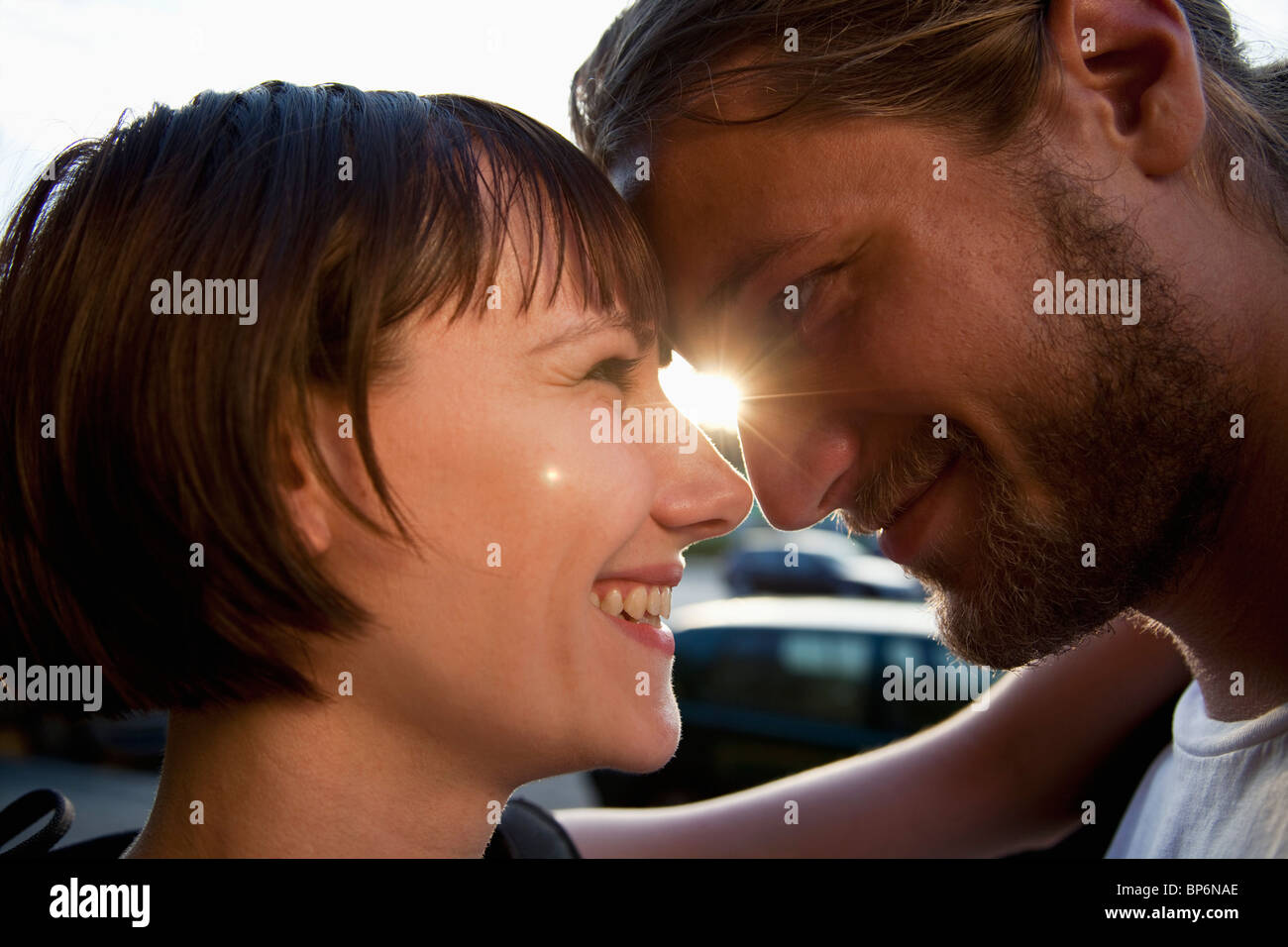 A loving young couple, face to face, close-up Stock Photo - Alamy
