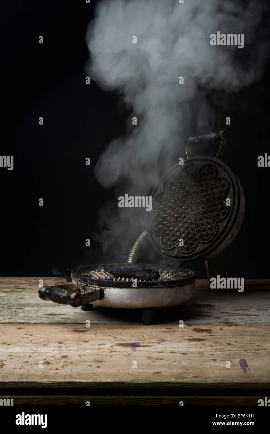 Smoke coming waffle iron hi-res stock photography and images - Alamy