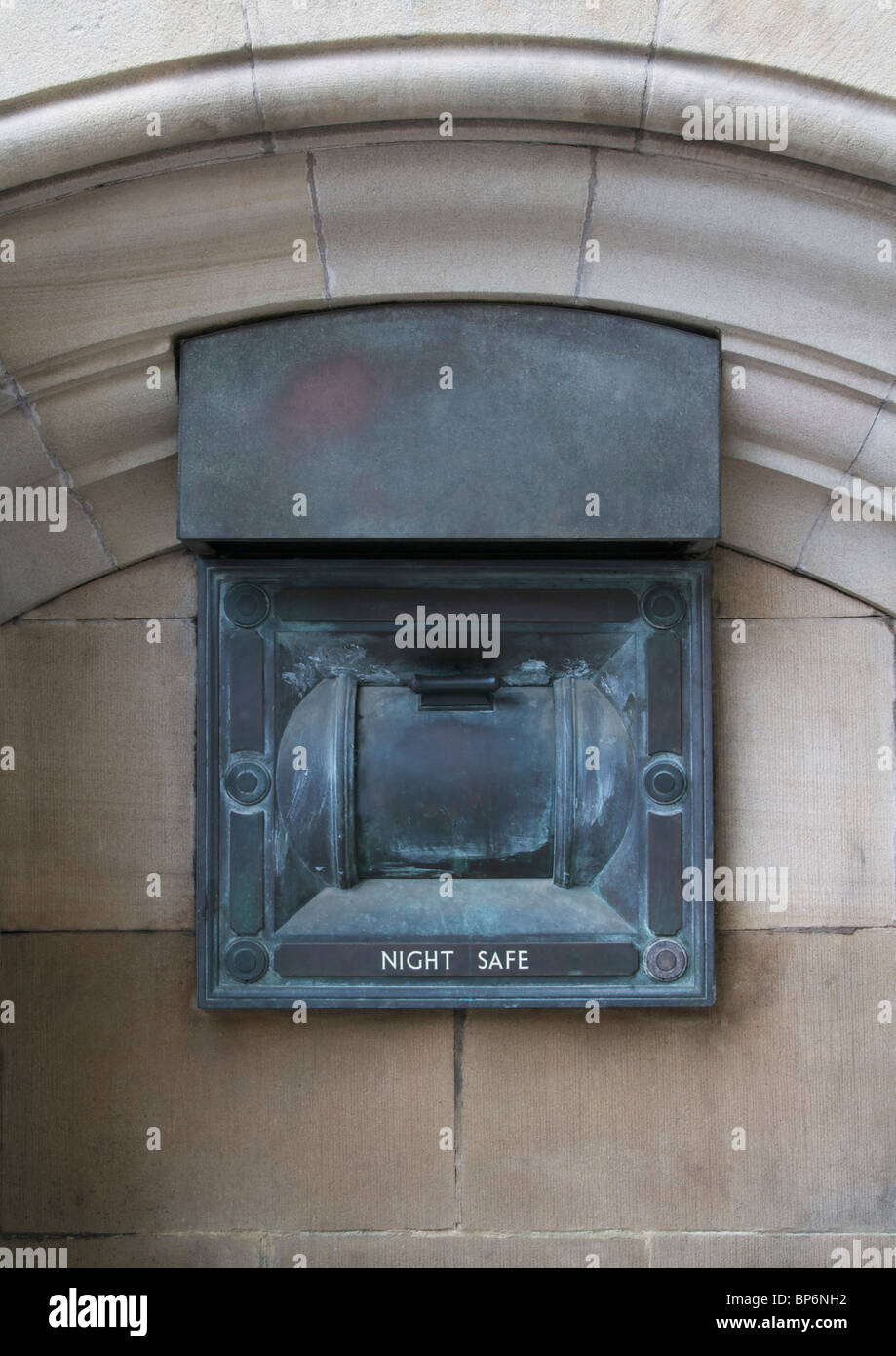 Night safe in sandstone wall Stock Photo - Alamy