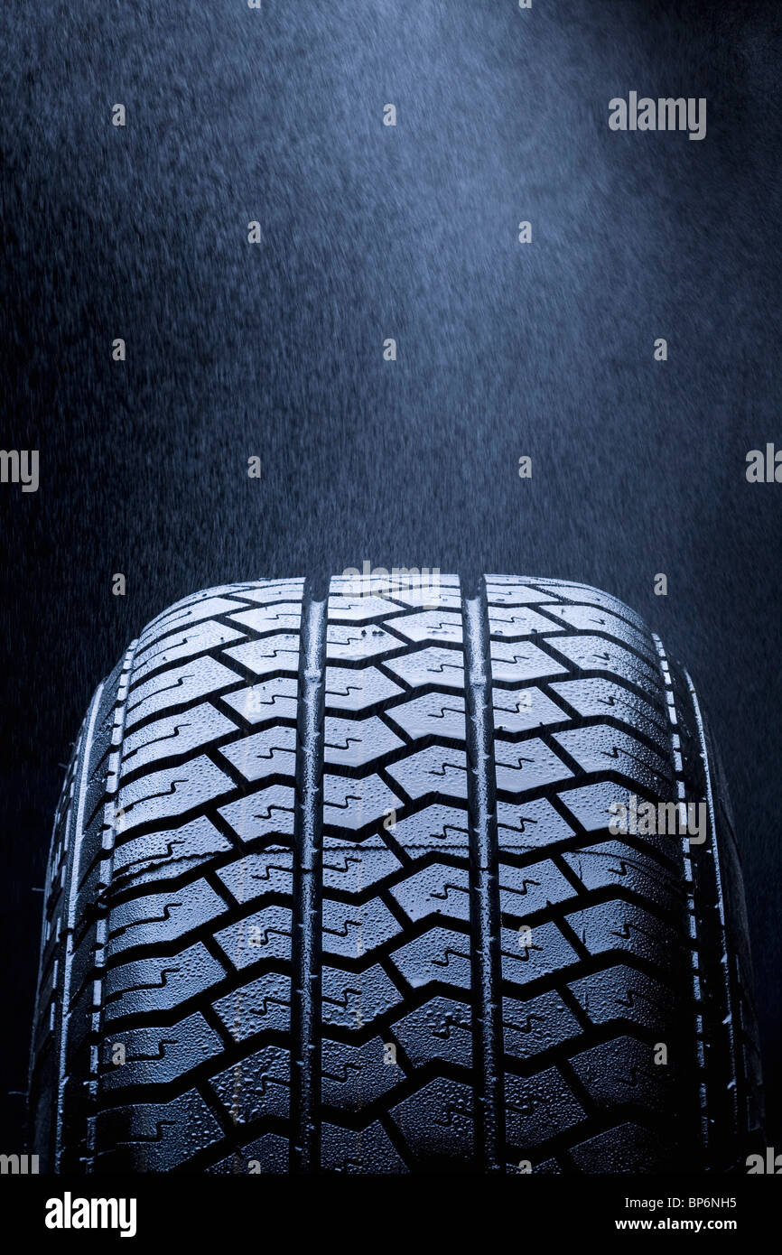 Detail of mist falling on a car tire Stock Photo - Alamy