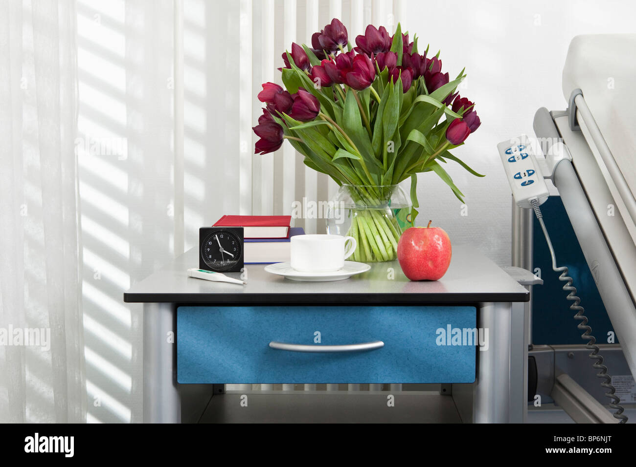Various objects on a bedside table in a hospital ward Stock Photo - Alamy