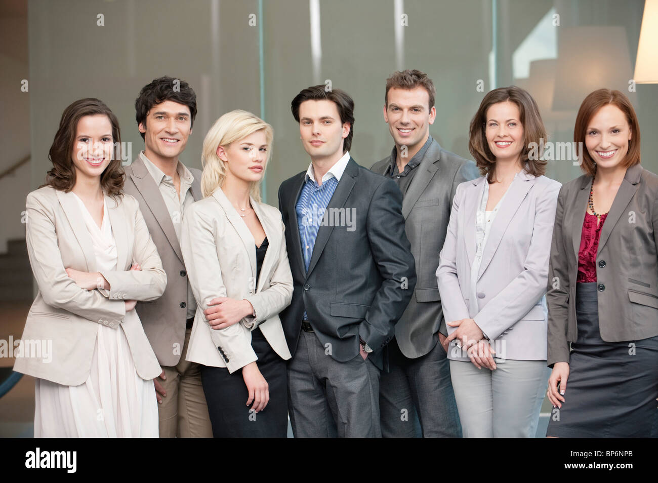 Business executives standing together Stock Photo - Alamy