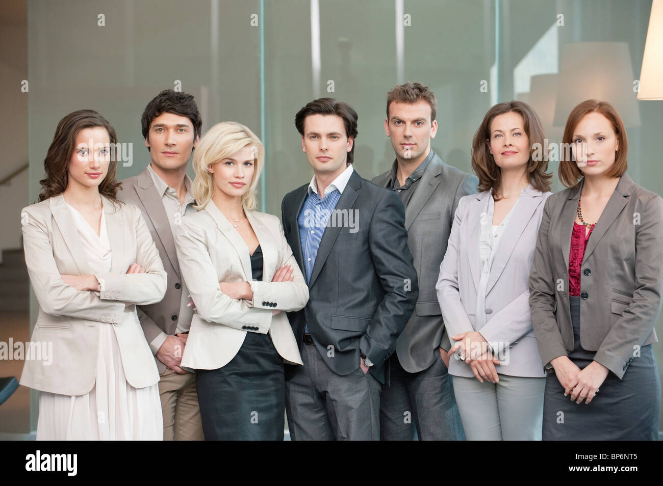 Business executives standing together Stock Photo - Alamy