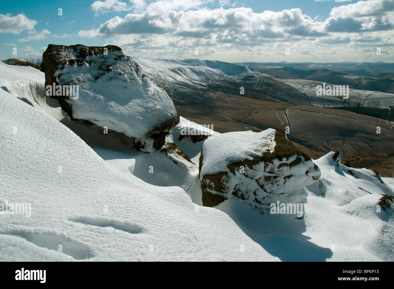 On the edge of the Kinder Scout plateau in winter, near Hayfield, Peak ...