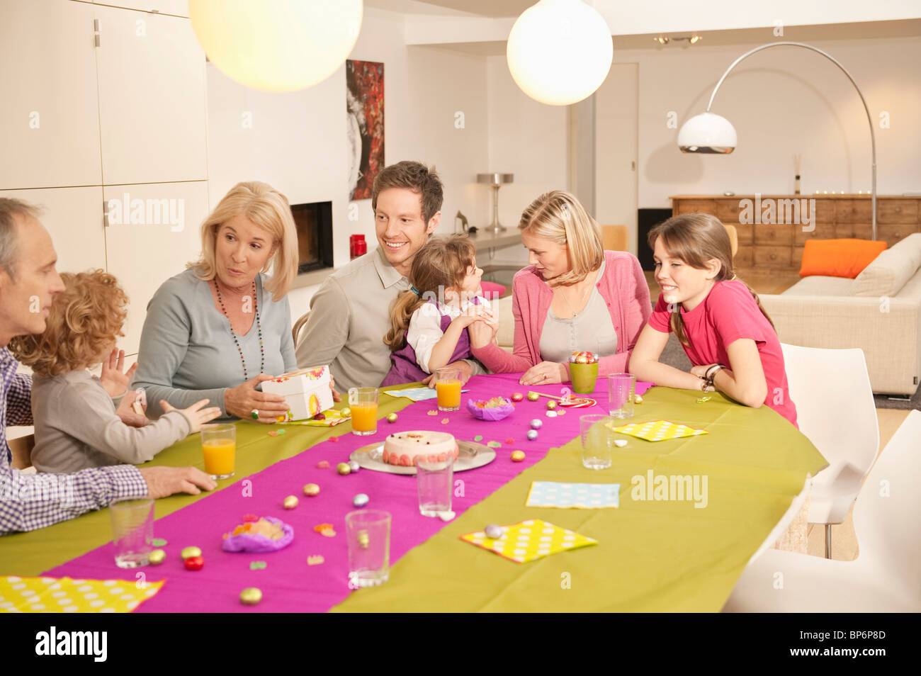 Family at a birthday celebration Stock Photo - Alamy
