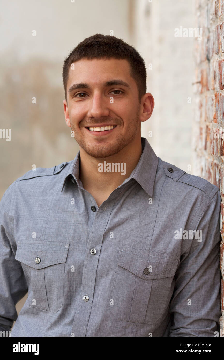 Portrait of a young man smiling Stock Photo - Alamy