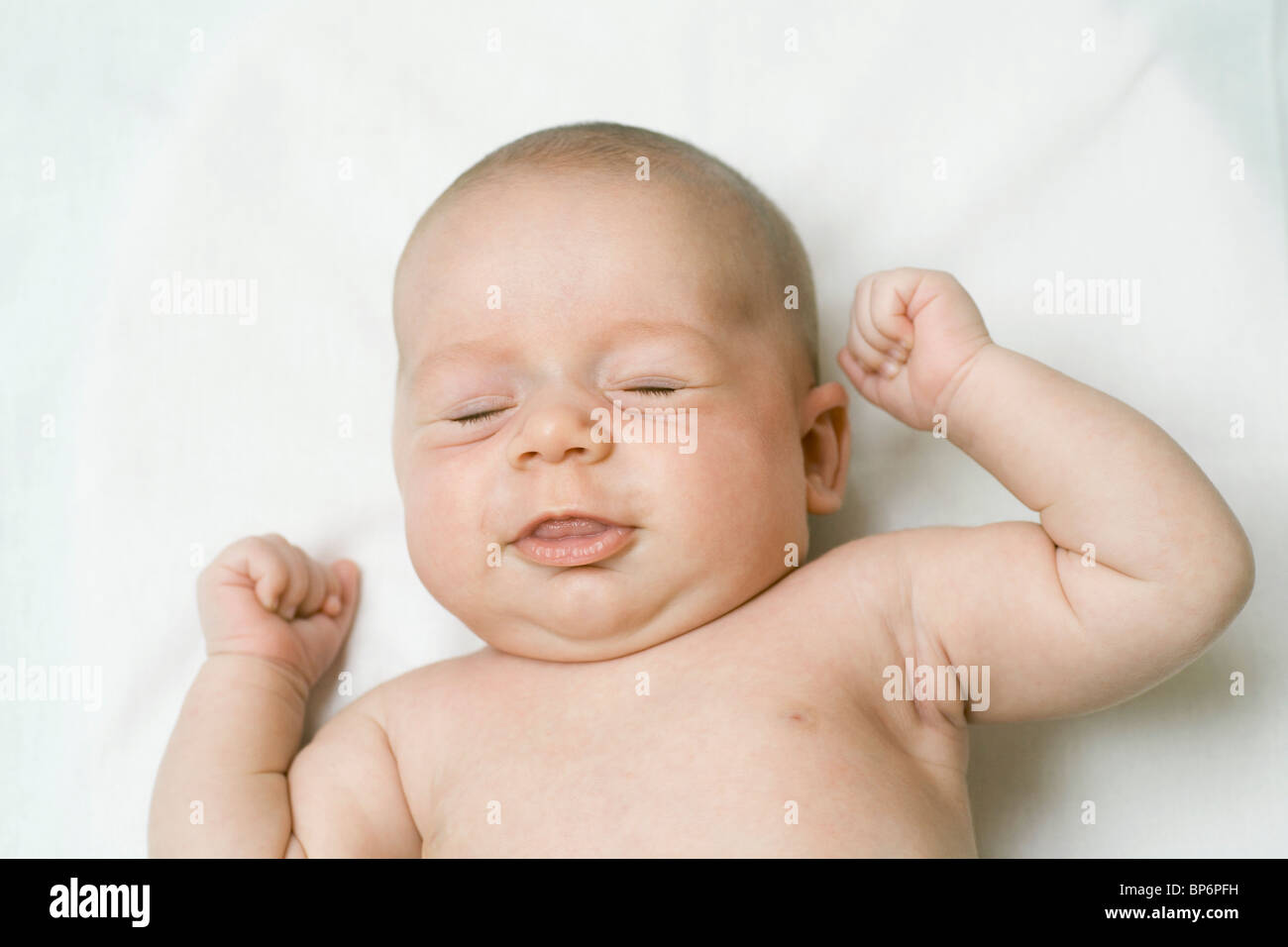 A baby stretching Stock Photo - Alamy