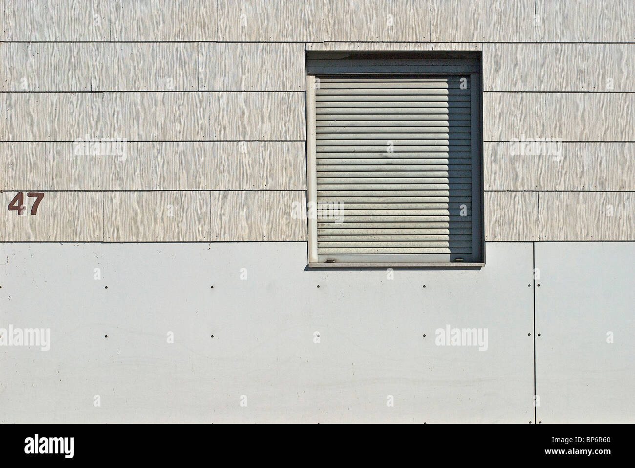 A closed rolling window shutter Stock Photo - Alamy