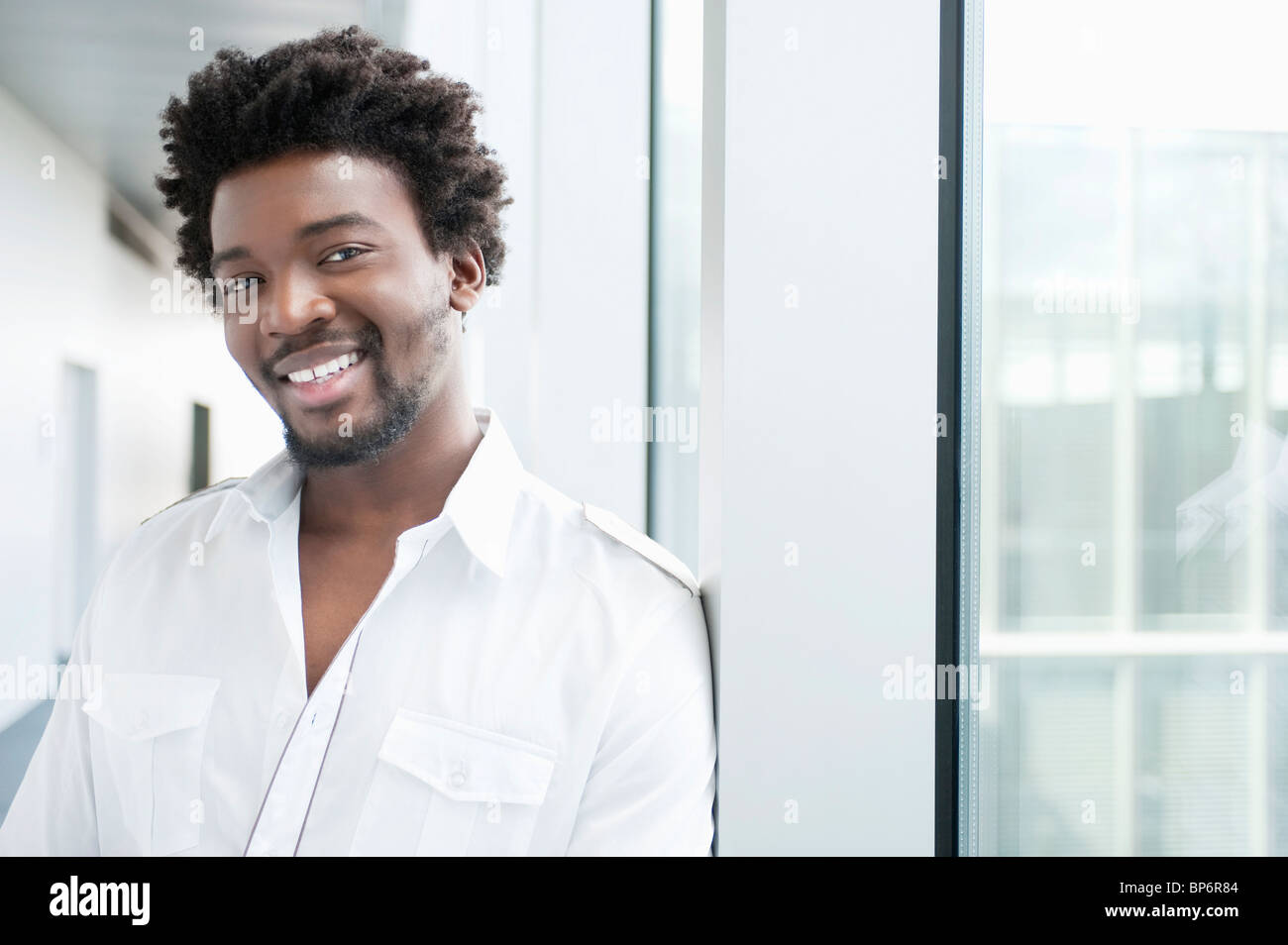 Portrait of a businessman smiling Stock Photo - Alamy
