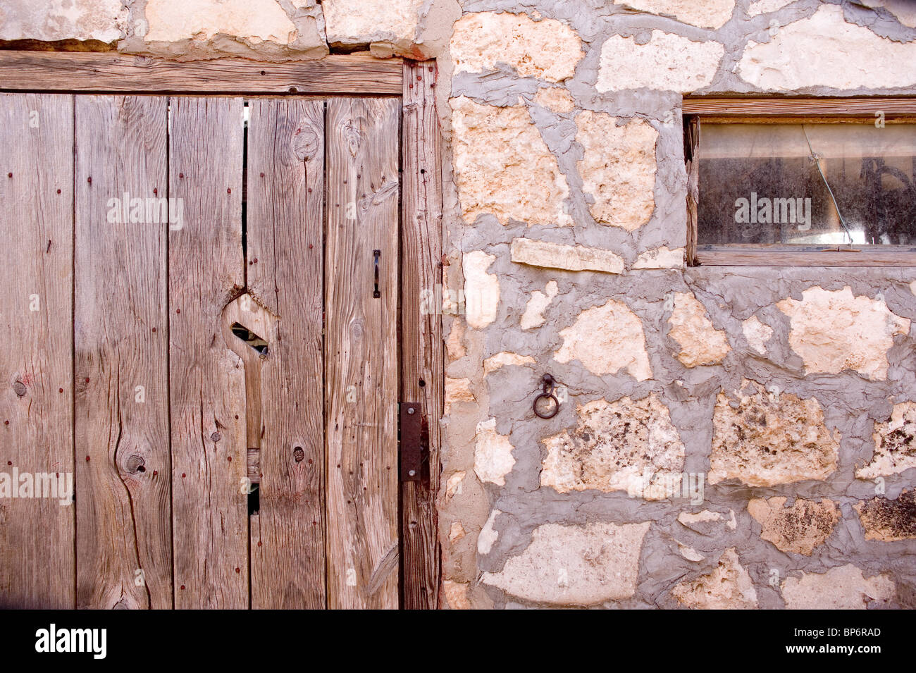 Wooden Door and Rock Barn Stock Photo - Alamy