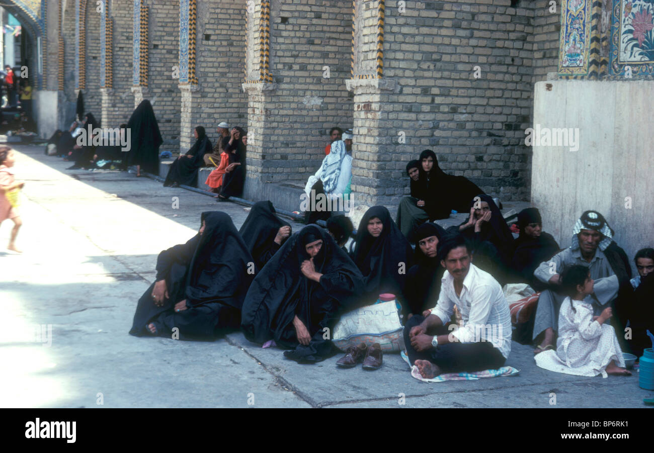 Shia families fasting during the month of Ramadan in the courtyard of ...