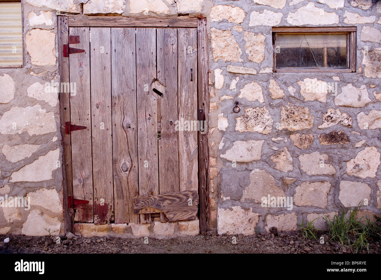 Wooden Door and Rock Barn Stock Photo - Alamy