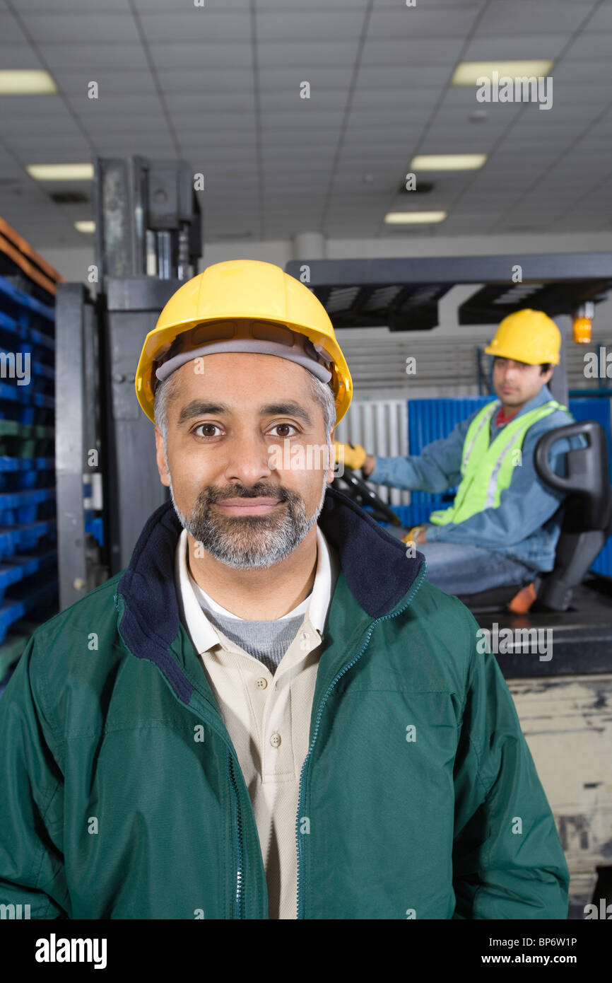 Wearing hart hat hi-res stock photography and images - Alamy