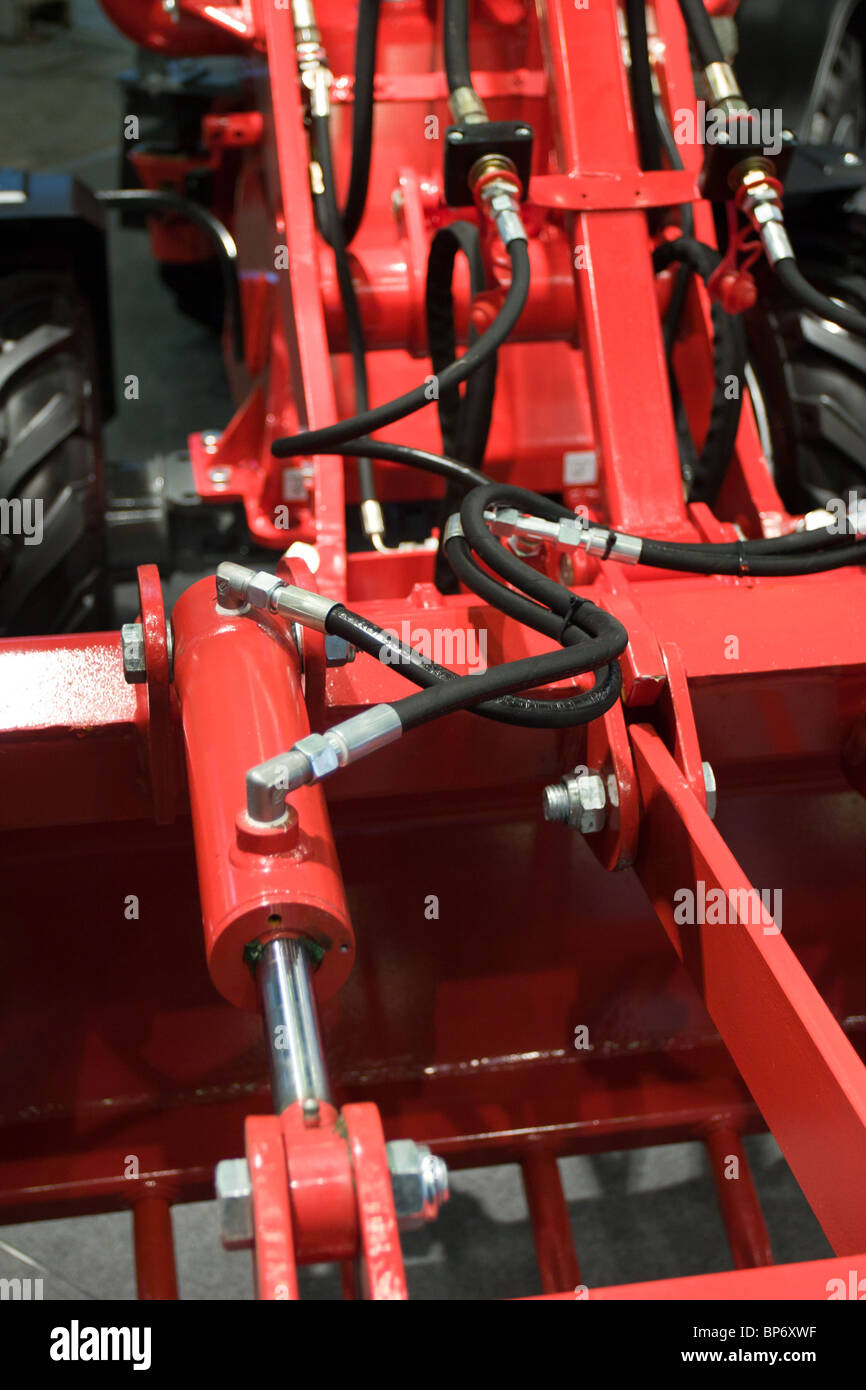 The Agricultural machinery details close up. red color Stock Photo - Alamy