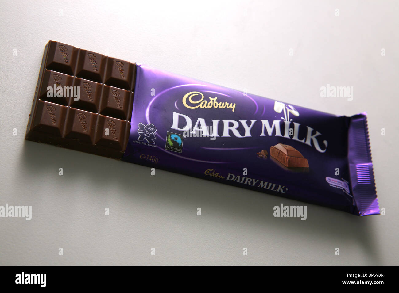 A bar of Cadbury Dairy Milk chocolate with its wrapper Stock Photo - Alamy
