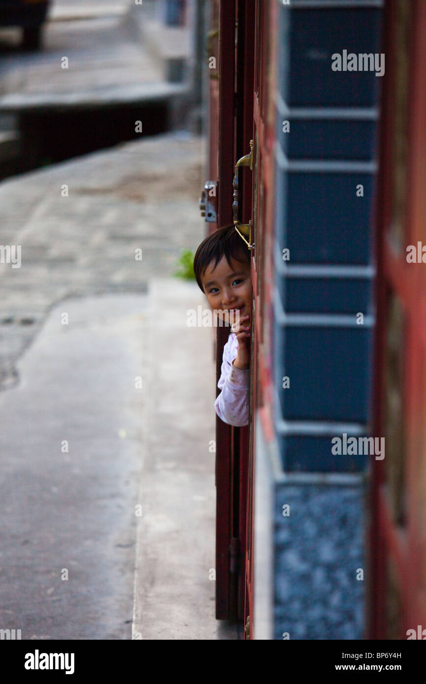 Child Peeking Around Corner