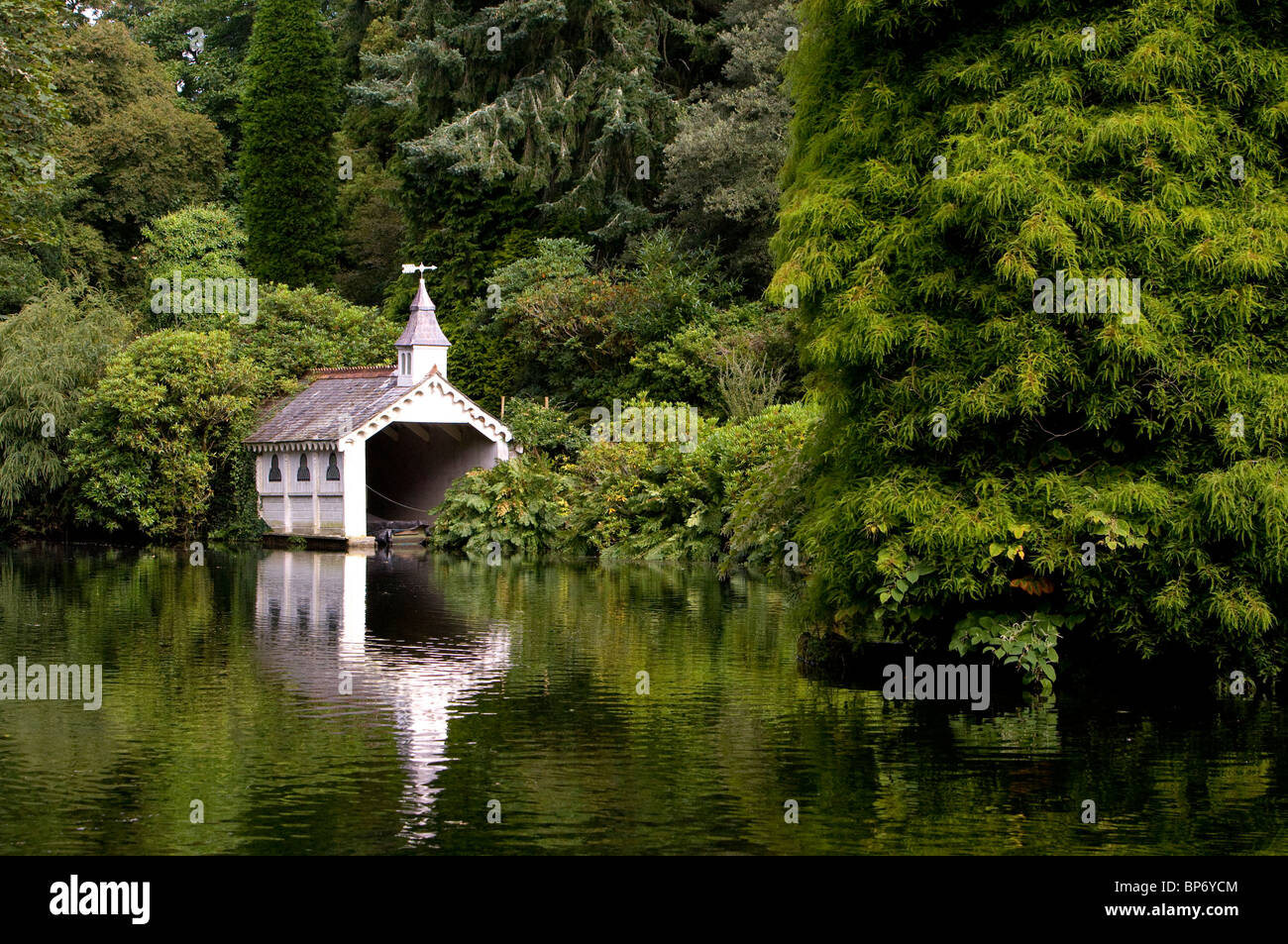 The boat house and lake at Trevarno Gardens near Helston, Cornwall ...