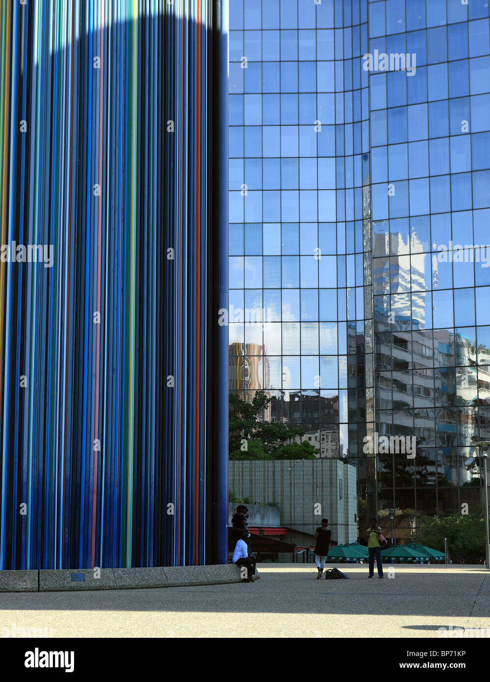 Buildings in La Defense district of Paris. La Moretti, the striped ...