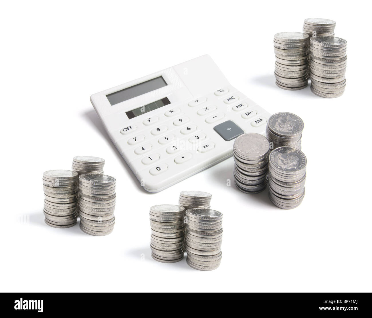 Calculator and Stacks of Coins Stock Photo - Alamy